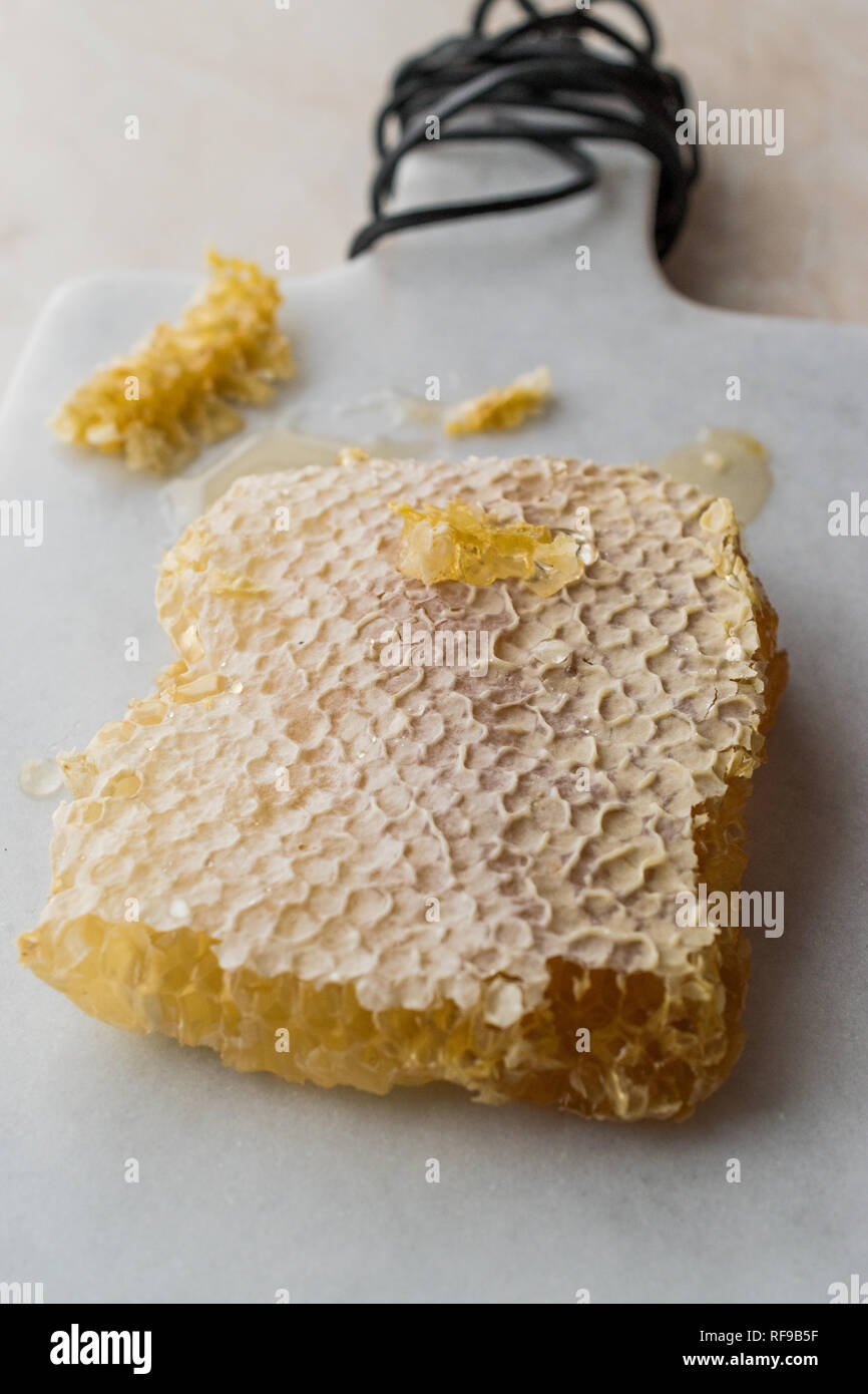 Fresh Honeycomb Slices with Honey on Marble Board. Organic Food Stock ...