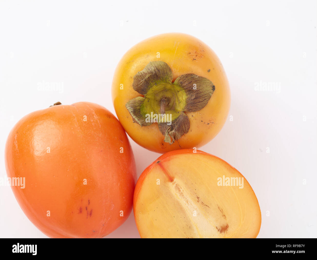 Persimmon, Sharon fruit, food still-life photograph Stock Photo - Alamy