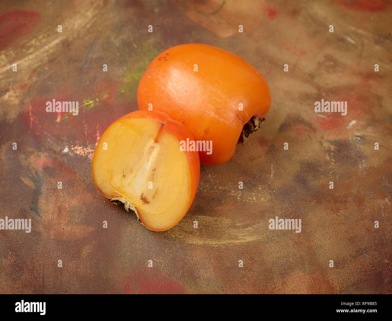 Persimmon, Sharon fruit, food still-life photograph Stock Photo - Alamy