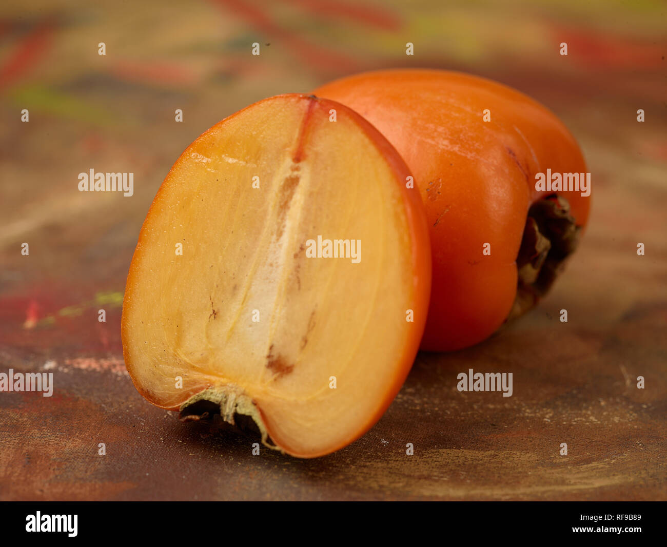 Persimmon, Sharon fruit, food still-life photograph Stock Photo - Alamy
