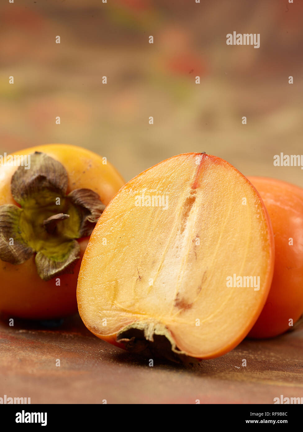 Persimmon, Sharon fruit, food still-life photograph Stock Photo - Alamy