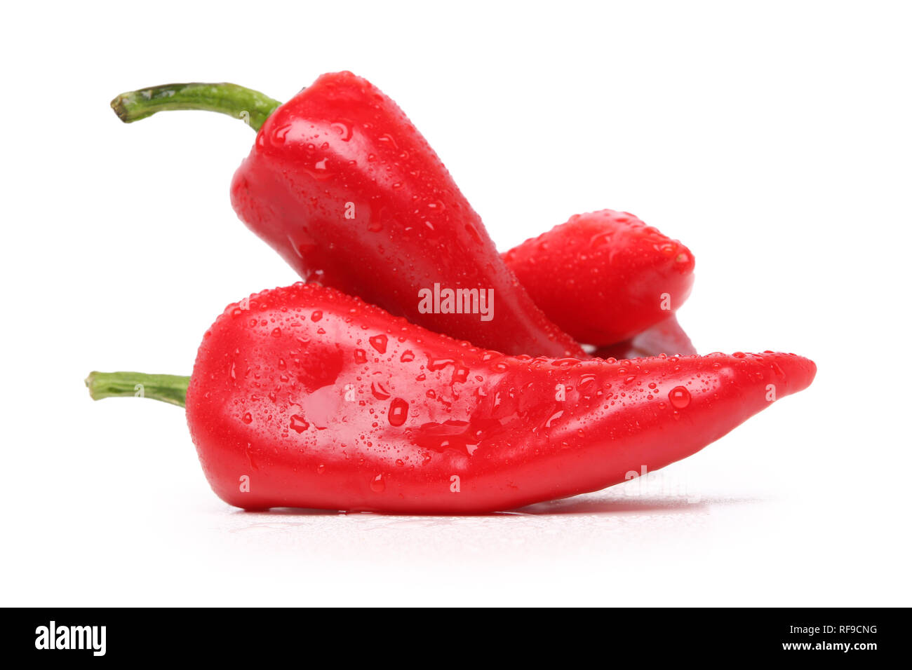 Chilli peppers, isolated on white Stock Photo - Alamy
