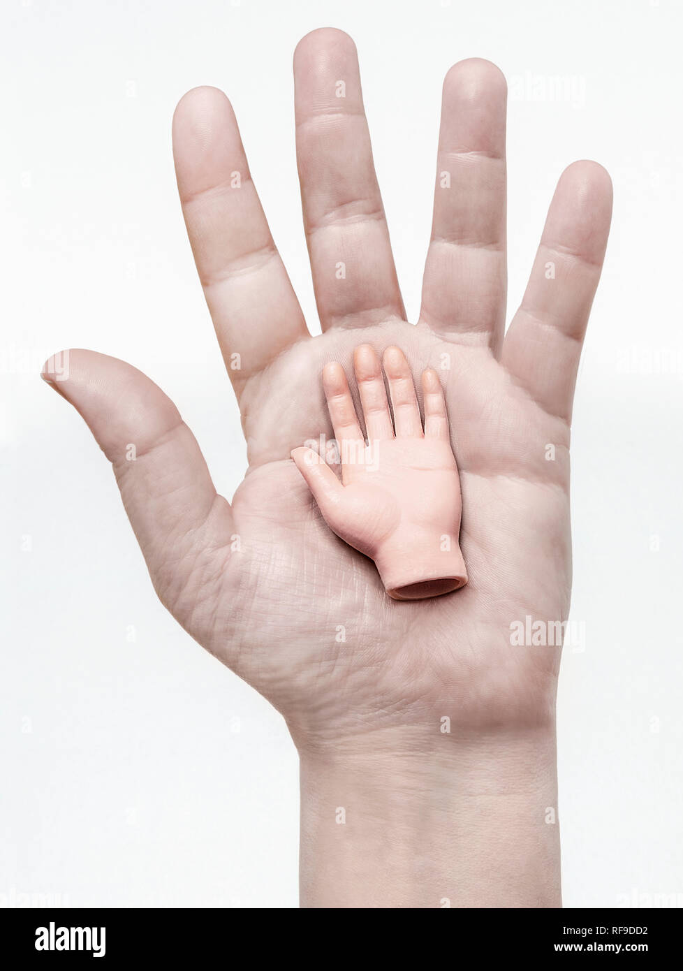 Helping hand hands hi-res stock photography and images - Alamy