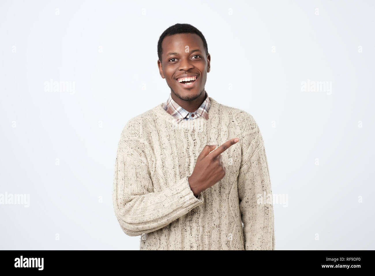 Happy man pointing finger over hi-res stock photography and images - Alamy