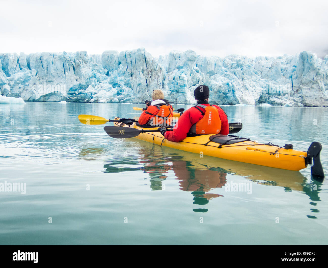 Kayaking Tourists Arctic Landscape Svalbard Norway // SVALBARD, Norway ...