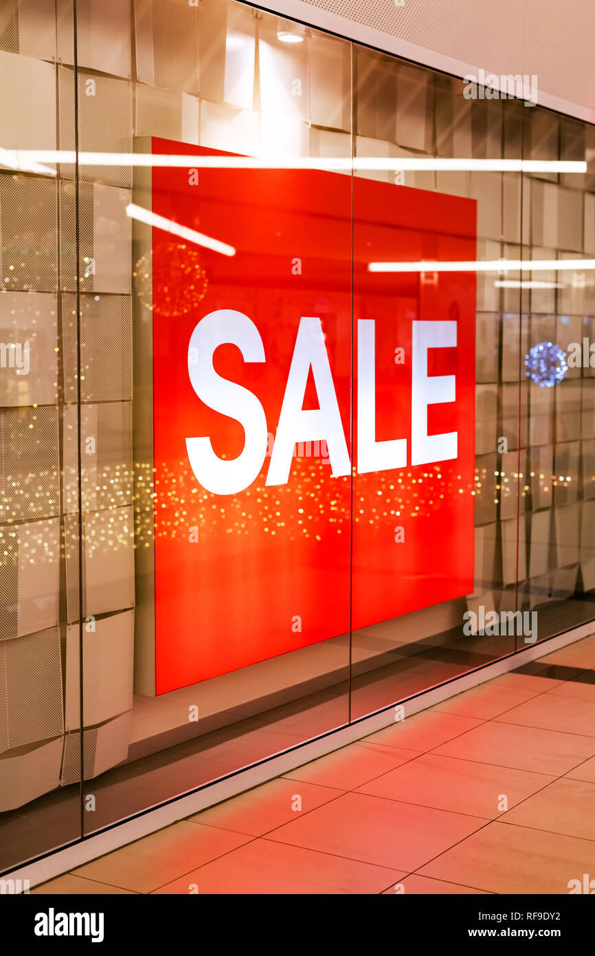 Sale banner in shop window for end of the season sales deals Stock ...
