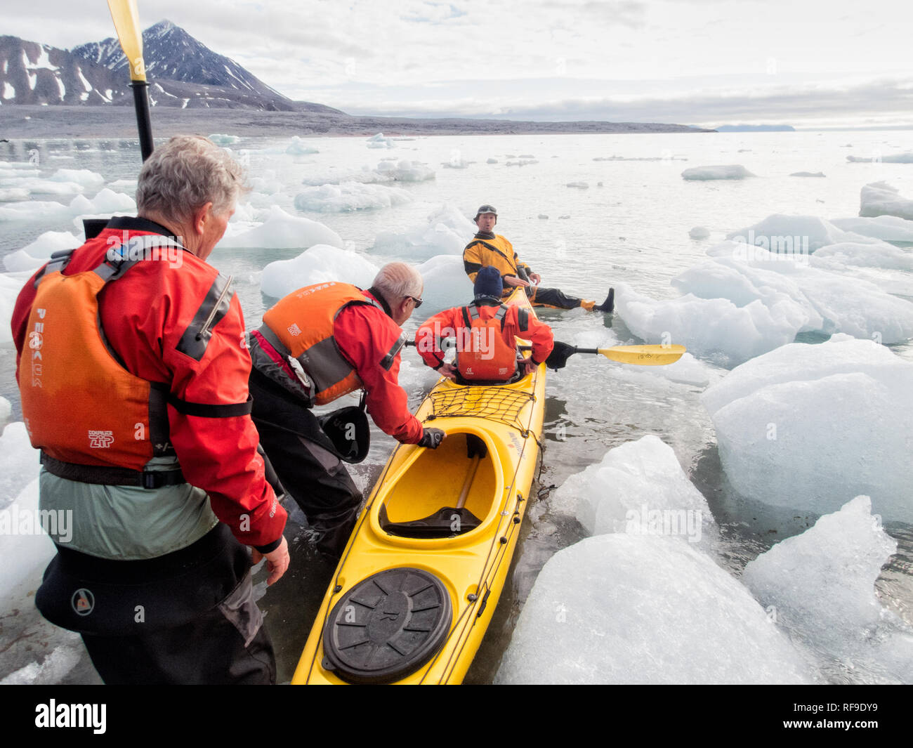 Kayaking Tourists Arctic Landscape Svalbard Norway // SVALBARD, Norway ...