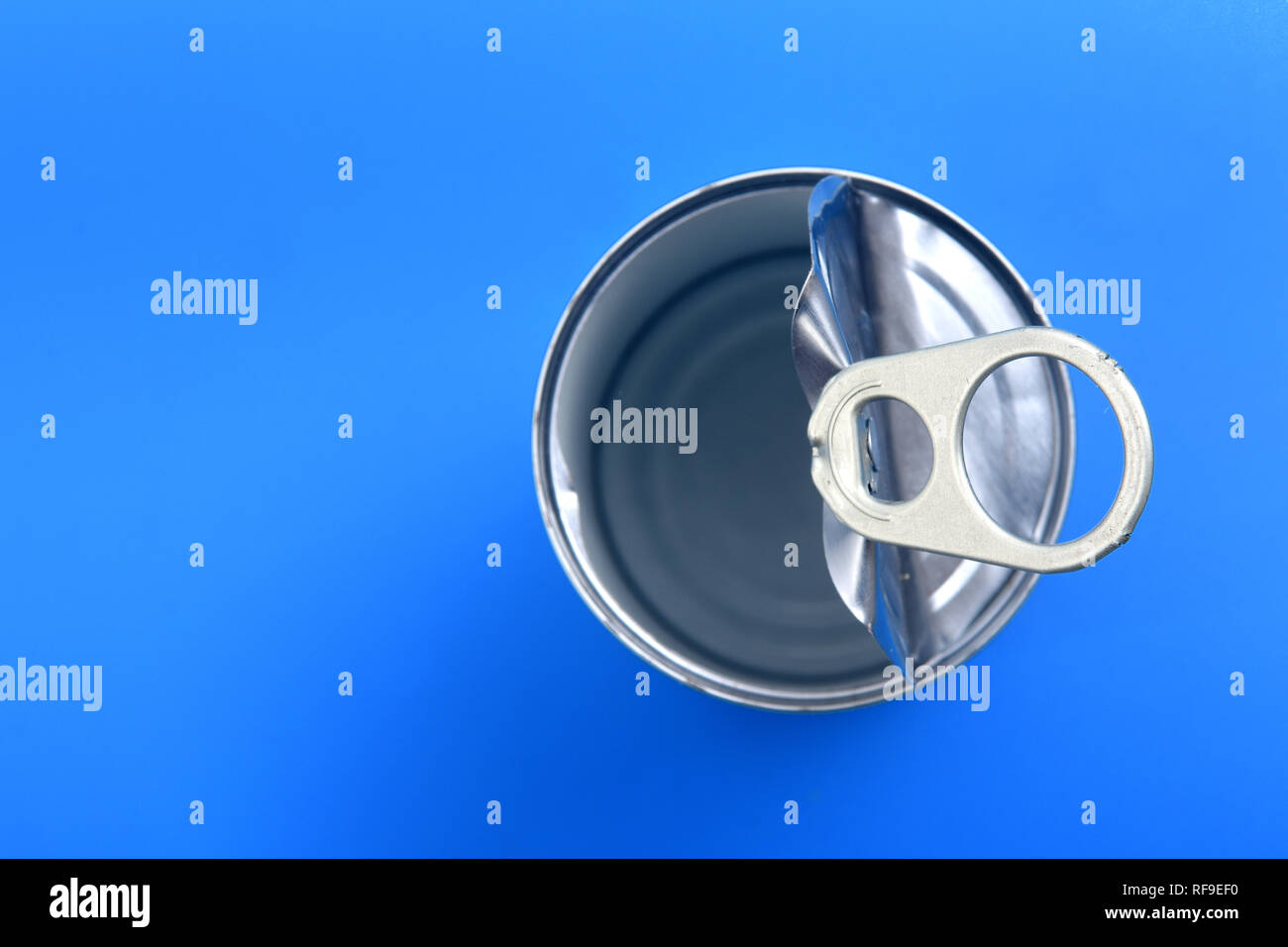 can isolated on blue background Stock Photo - Alamy