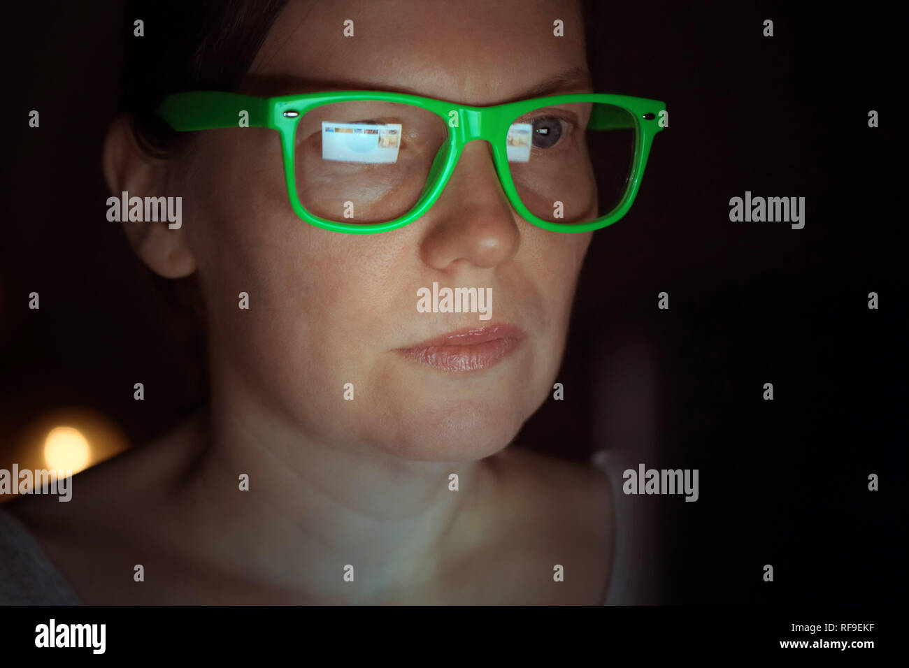 Woman Working Overtime On Laptop Computer Late At Night Low Key Portrait Of Female Entrepreneur