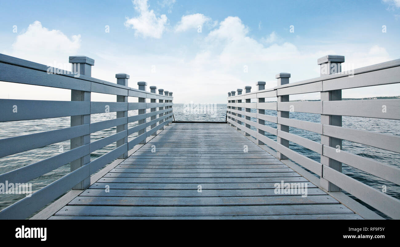 Pier with fence on the sea Stock Photo - Alamy