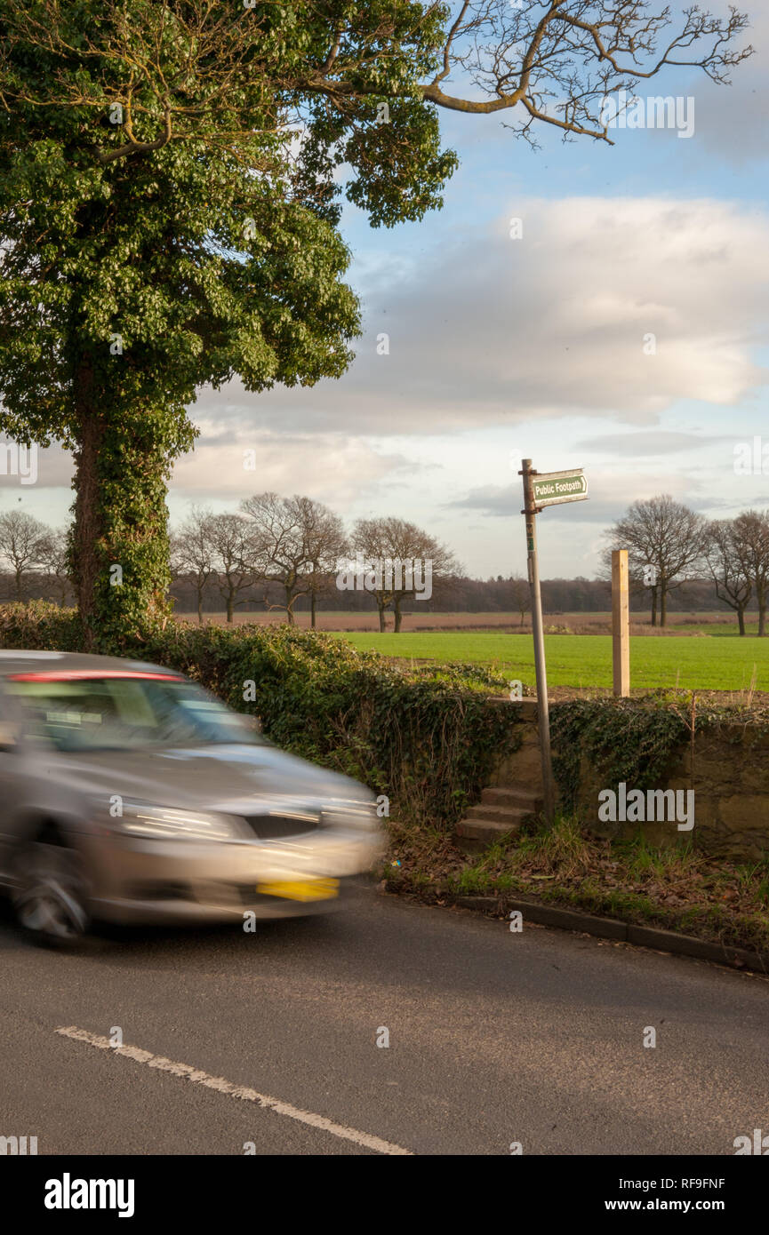 Traffic in a rural English Village Stock Photo - Alamy