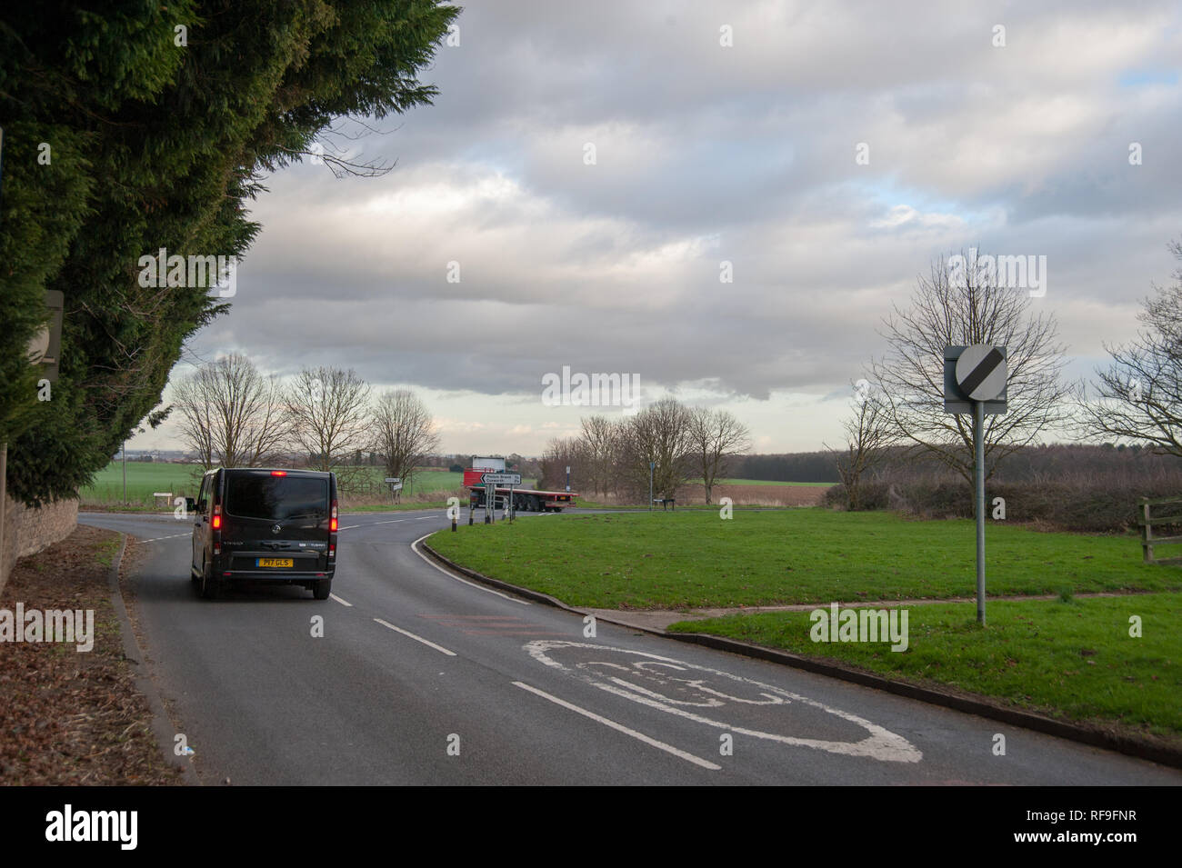 Traffic in a rural English Village Stock Photo - Alamy