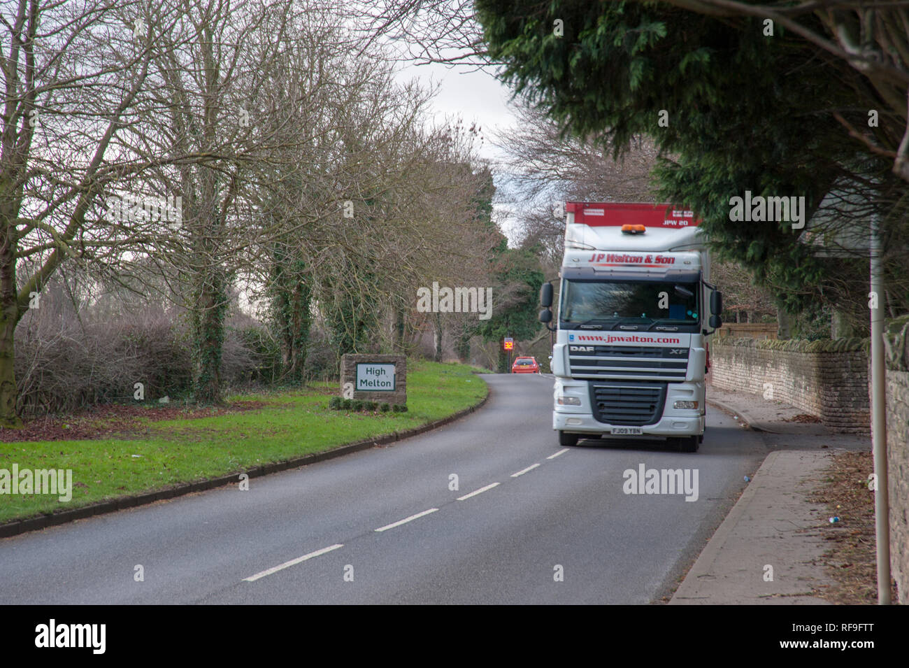 UK road scenes featuring a bus, lorry, and cars navigating winding ...