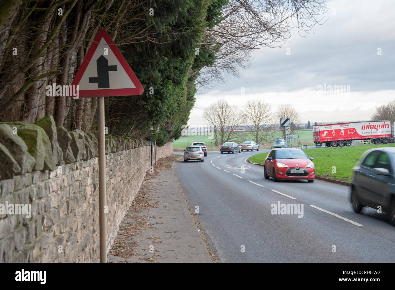 UK road scenes featuring a bus, lorry, and cars navigating winding ...