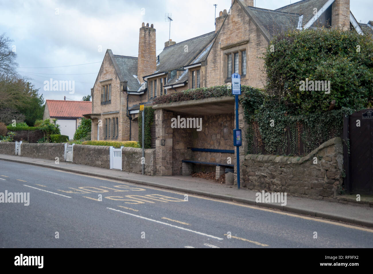 Traffic in a rural English Village Stock Photo - Alamy
