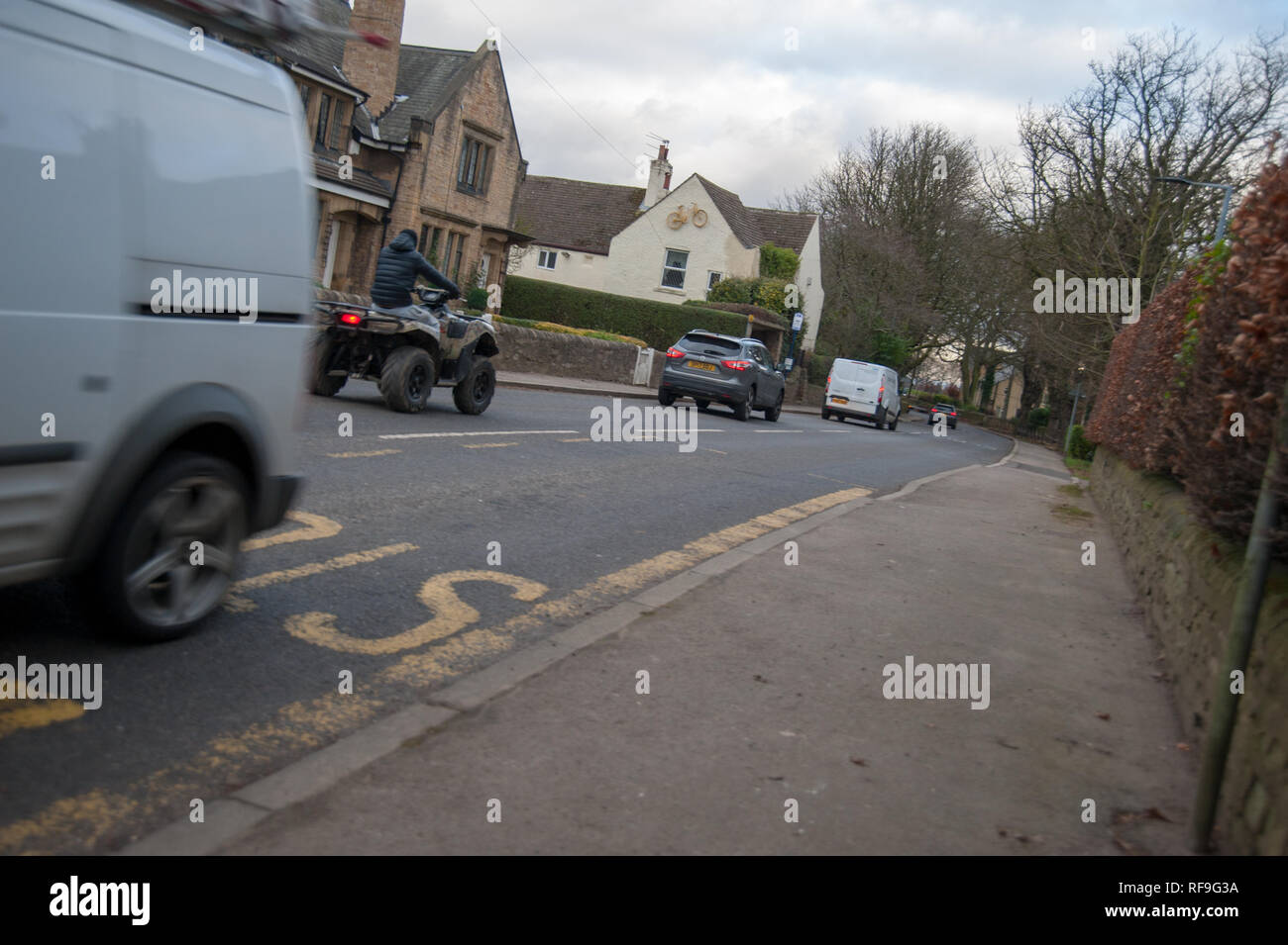 Traffic in a rural English Village Stock Photo - Alamy