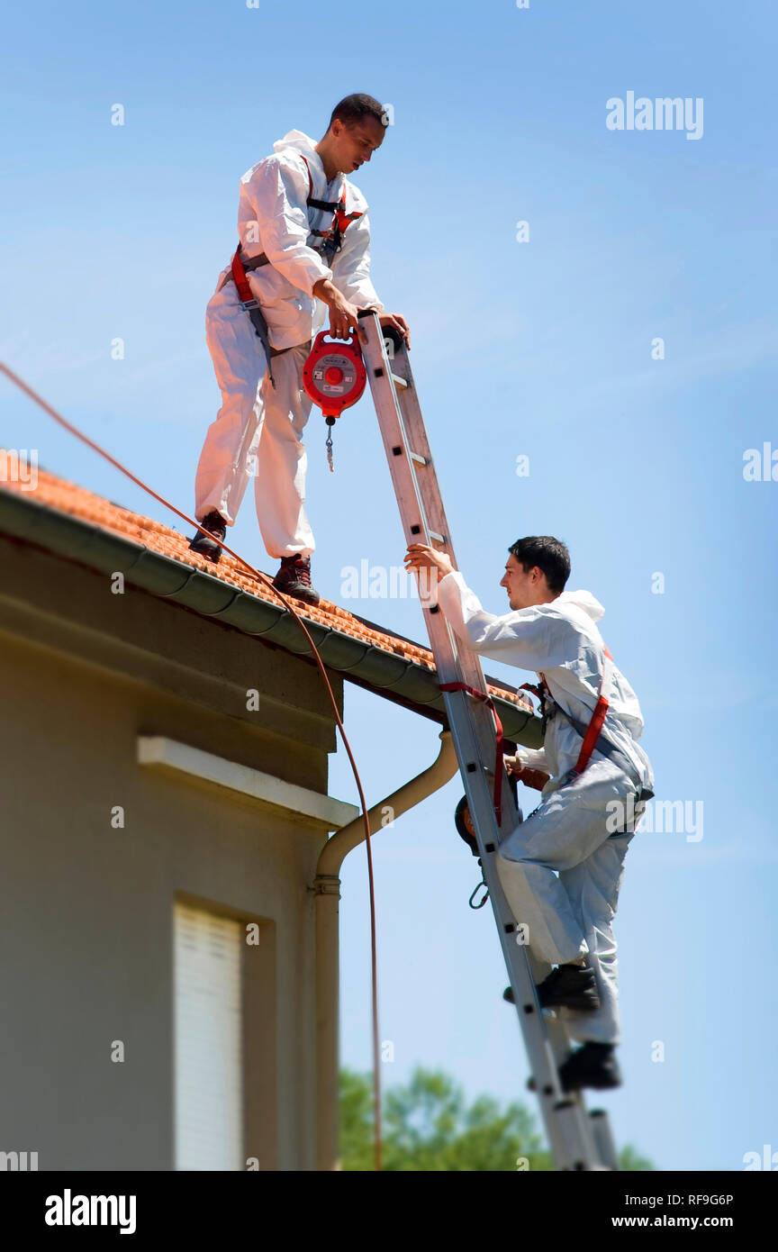 Roof renovation works and treating of the tiles of a private house. Two ...