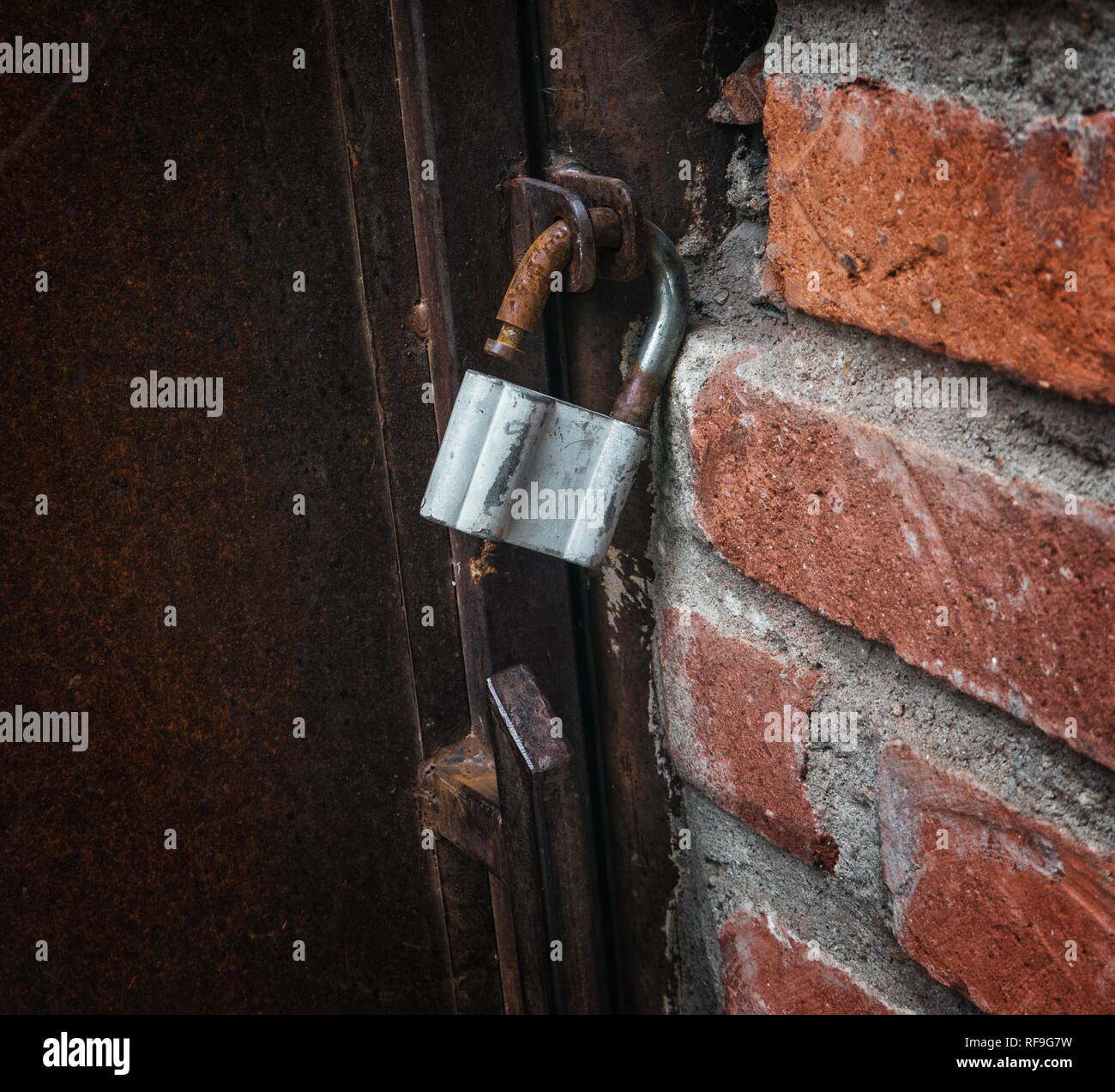 Old rustic gate lock closeup Stock Photo - Alamy