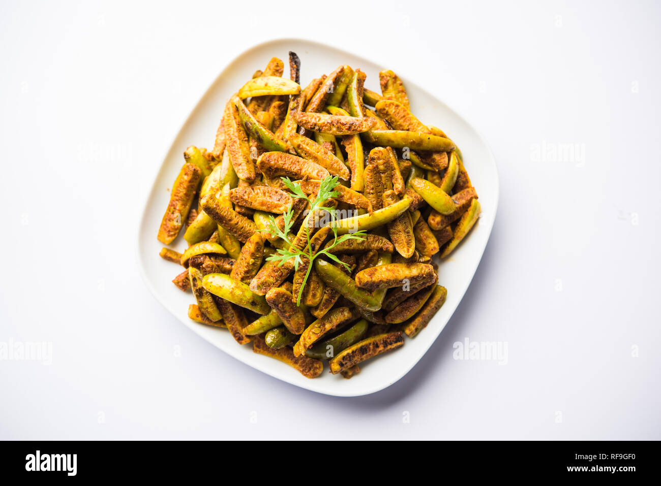 Tindora Sabzi / Tendli / tondli Fry also known as Ivy Gourd fry recipe ...