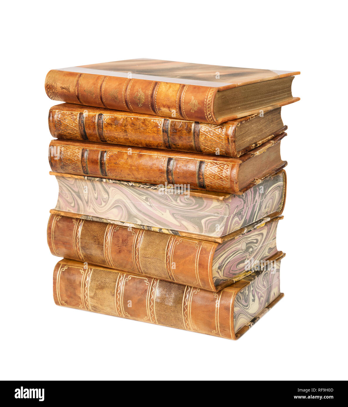Big heap of antique books in a leather hardcover isolated on white ...