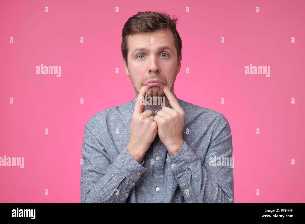 Sad handsome man hi-res stock photography and images - Alamy