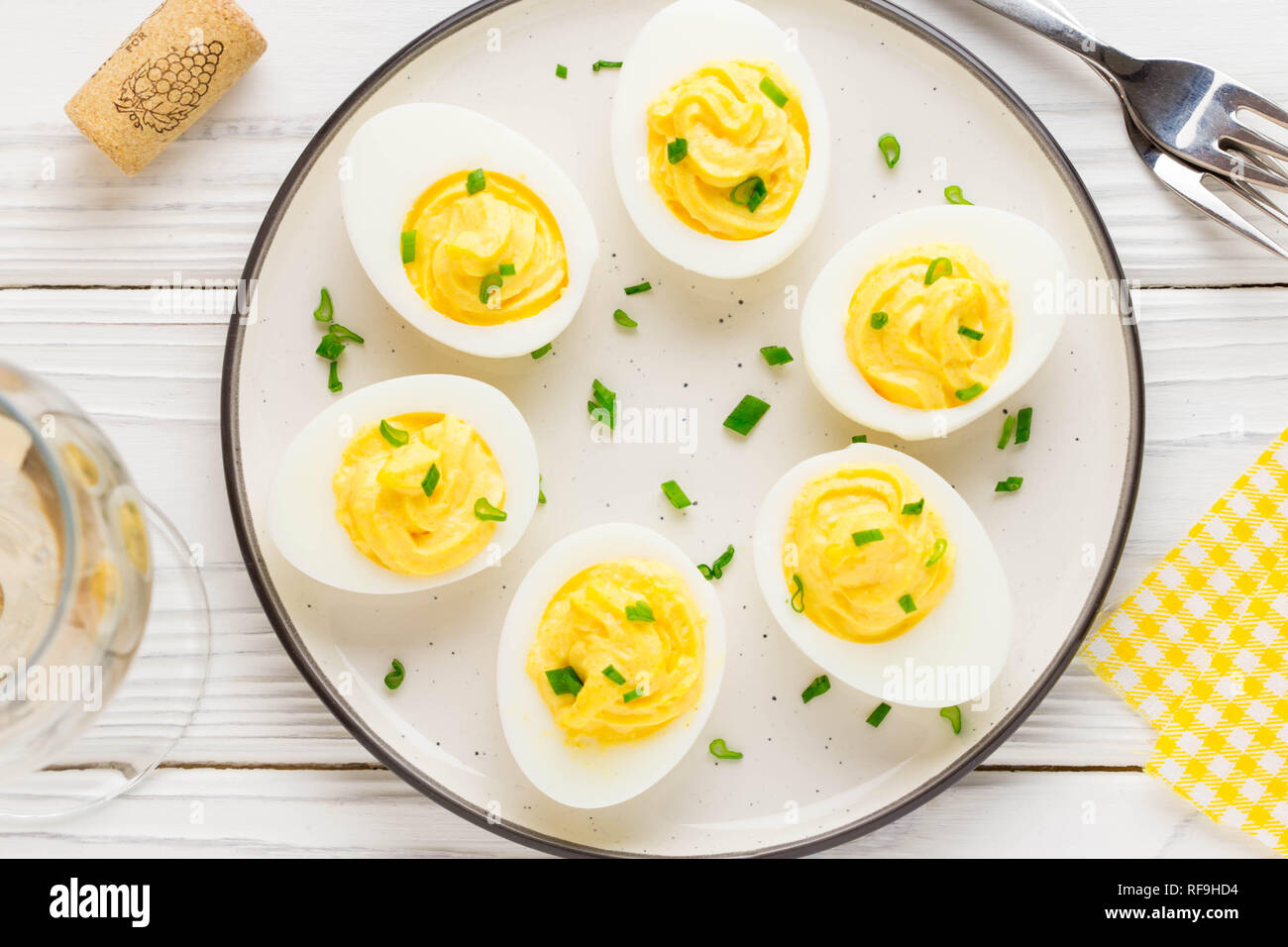 Stuffed eggs, yellow mousse, wine snack, holiday party Stock Photo - Alamy