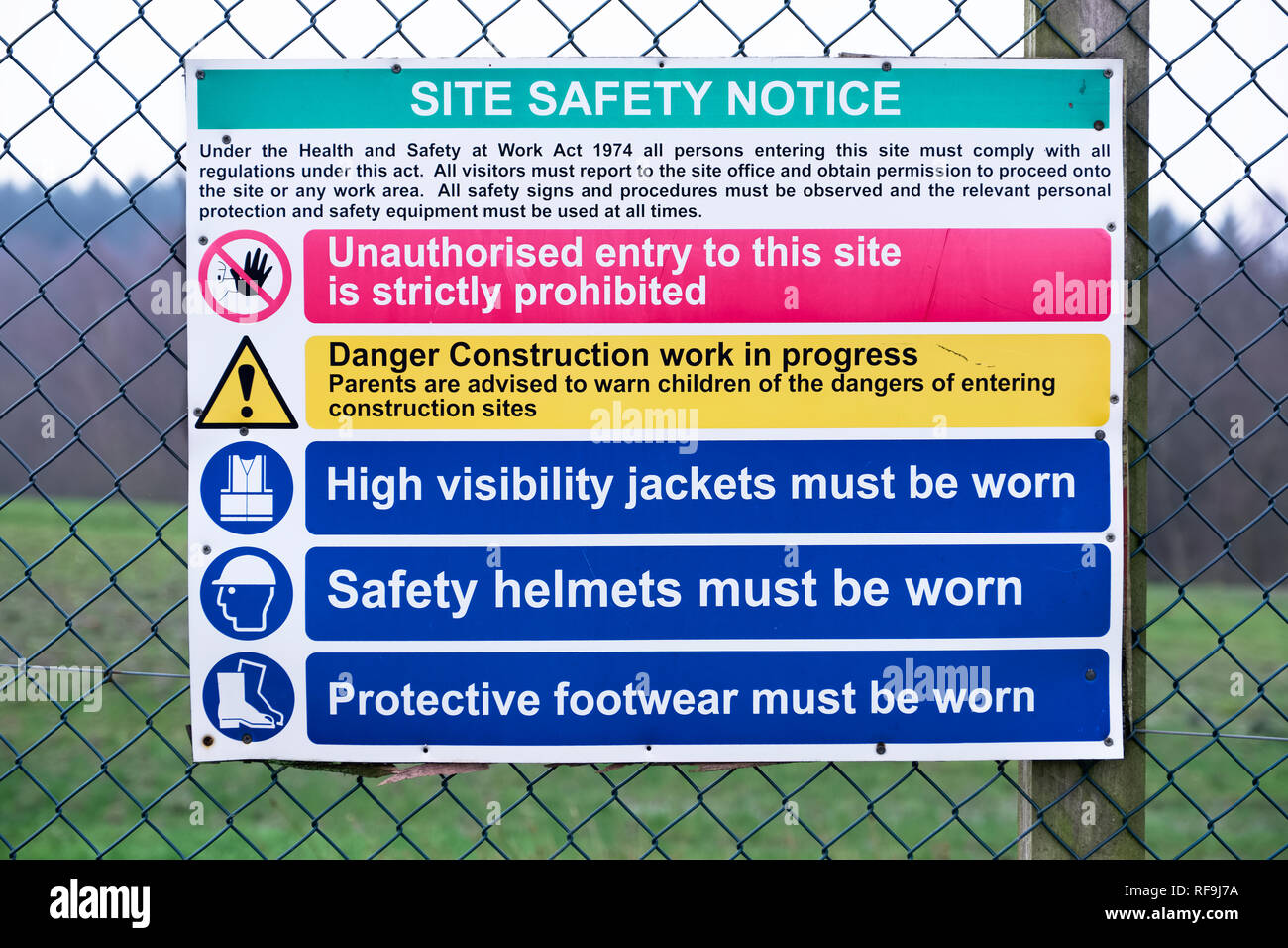 Building site construction safety notice sign on fence Stock Photo - Alamy