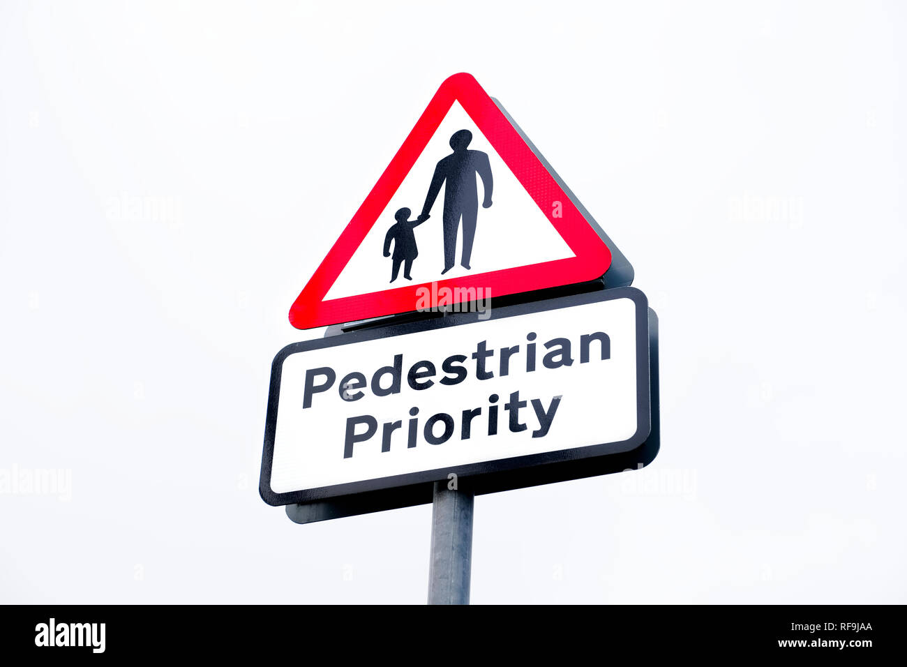 Pedestrian priority sign Stock Photo - Alamy