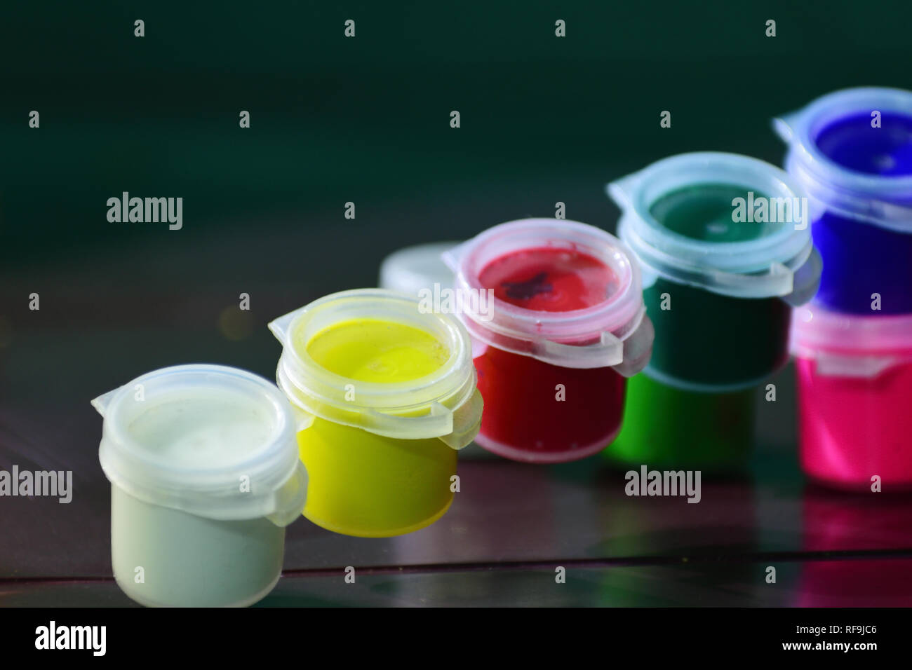 Beautiful small painting container filled with different colors Stock ...