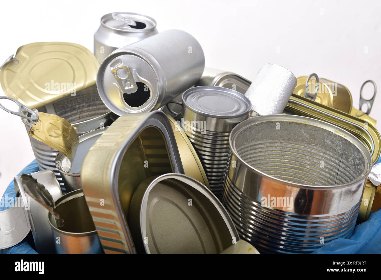 tin cans inside a garbage can,front view Stock Photo - Alamy