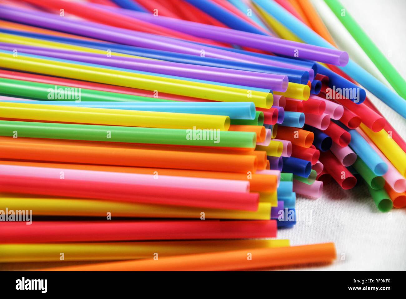 Colorful plastic drinking straws close up white background Stock Photo ...