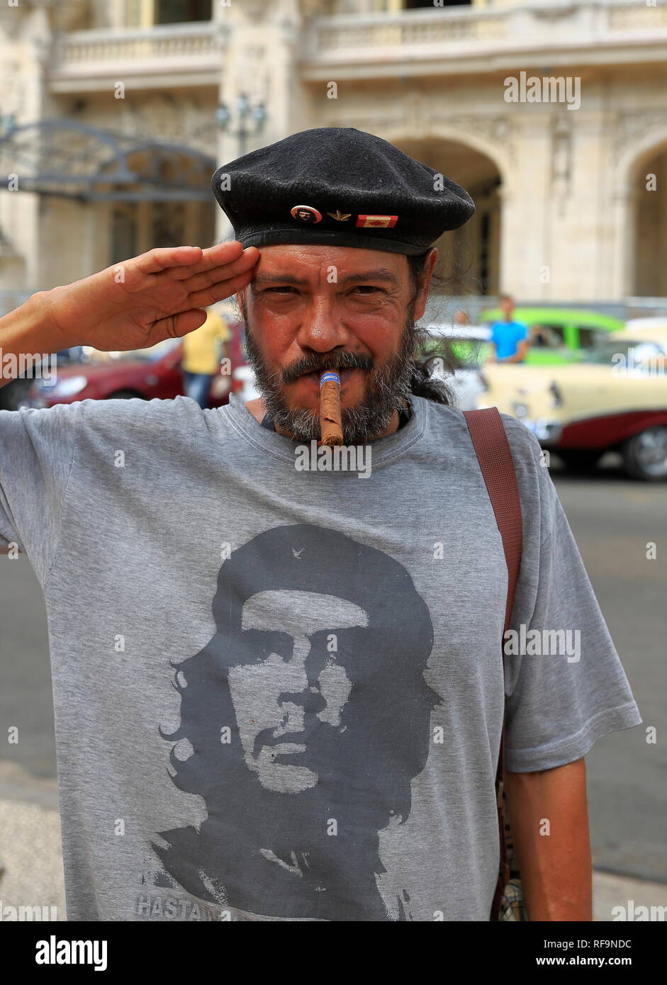 Havana, Church Square, Cuba - A Cuban man giving greetings to tourists ...
