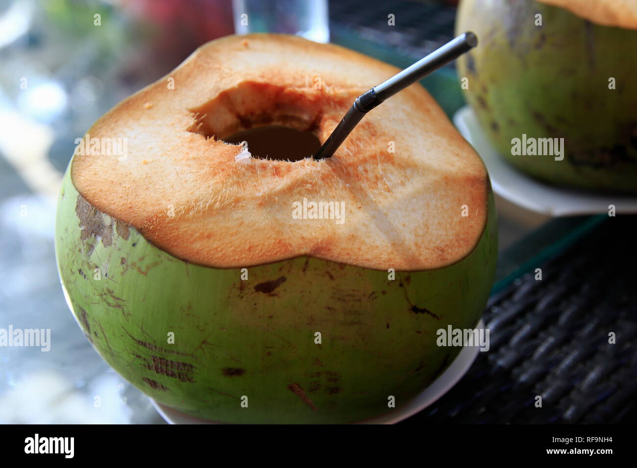 Fresh drink with, Coconat and pipette Stock Photo - Alamy