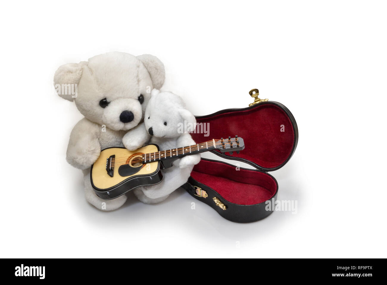 Parent and child teddy bears playing guitar Stock Photo - Alamy