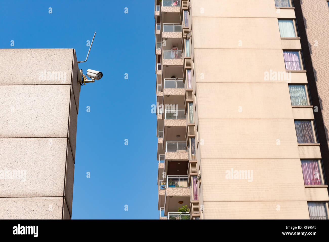 CCTV camera in front of a residential building Stock Photo - Alamy