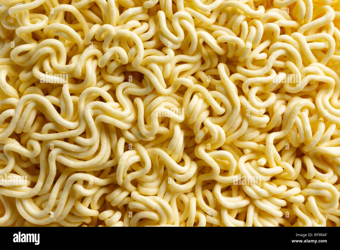 instant noodles or dried noodles as background Stock Photo - Alamy