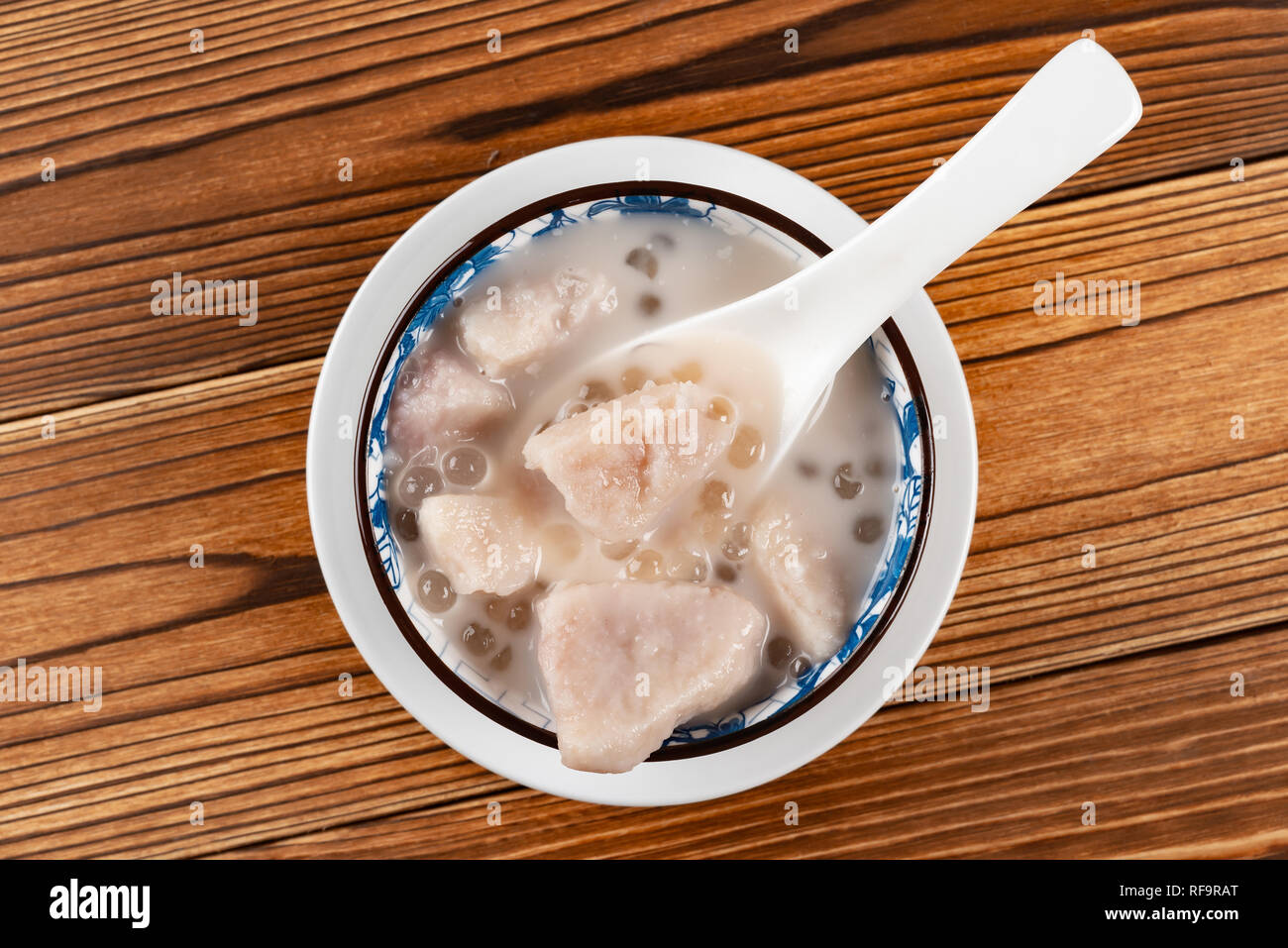 top view Chinese syrup of sweet potato and sago with shredded coconut ...