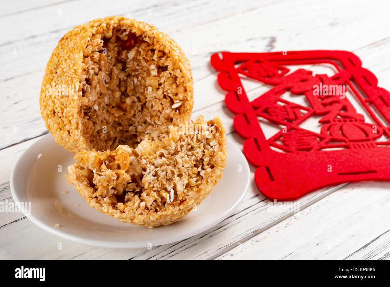 cut out traditional Chinese fried sesame ball with a label on back ...