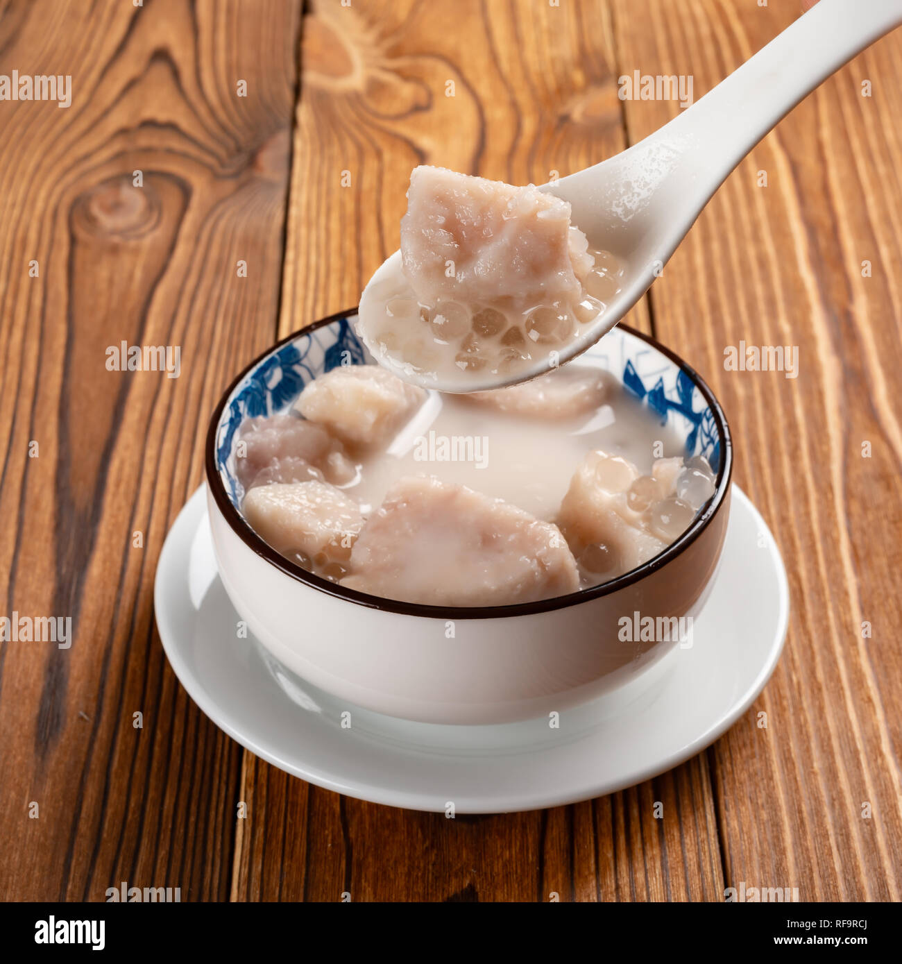 Chinese syrup of sweet potato and sago with shredded coconut Stock ...