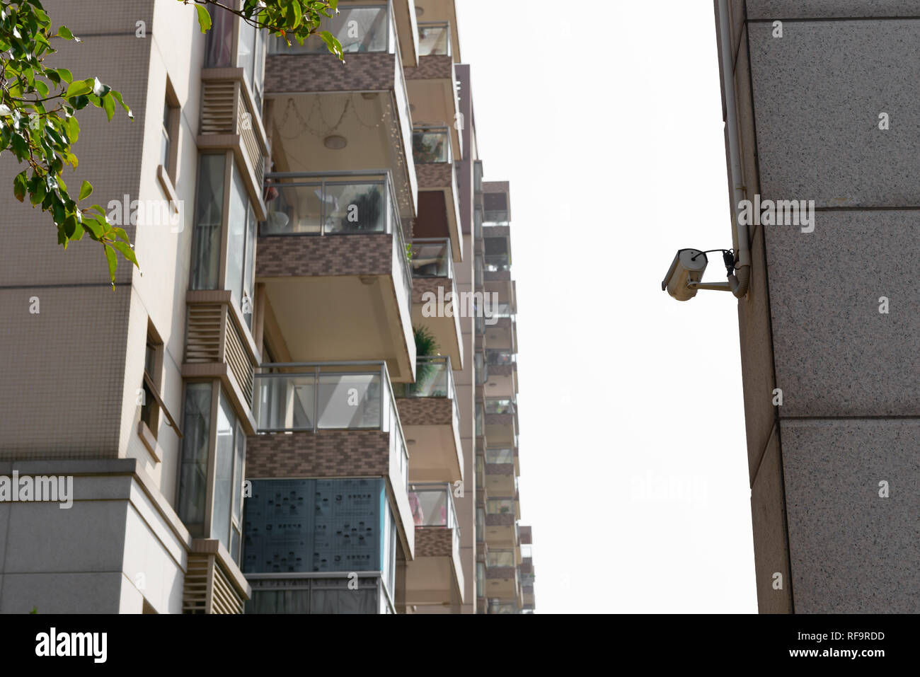 CCTV camera in front of a residential building Stock Photo - Alamy