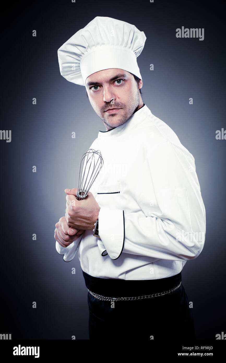 Funny chef with whisk Stock Photo - Alamy