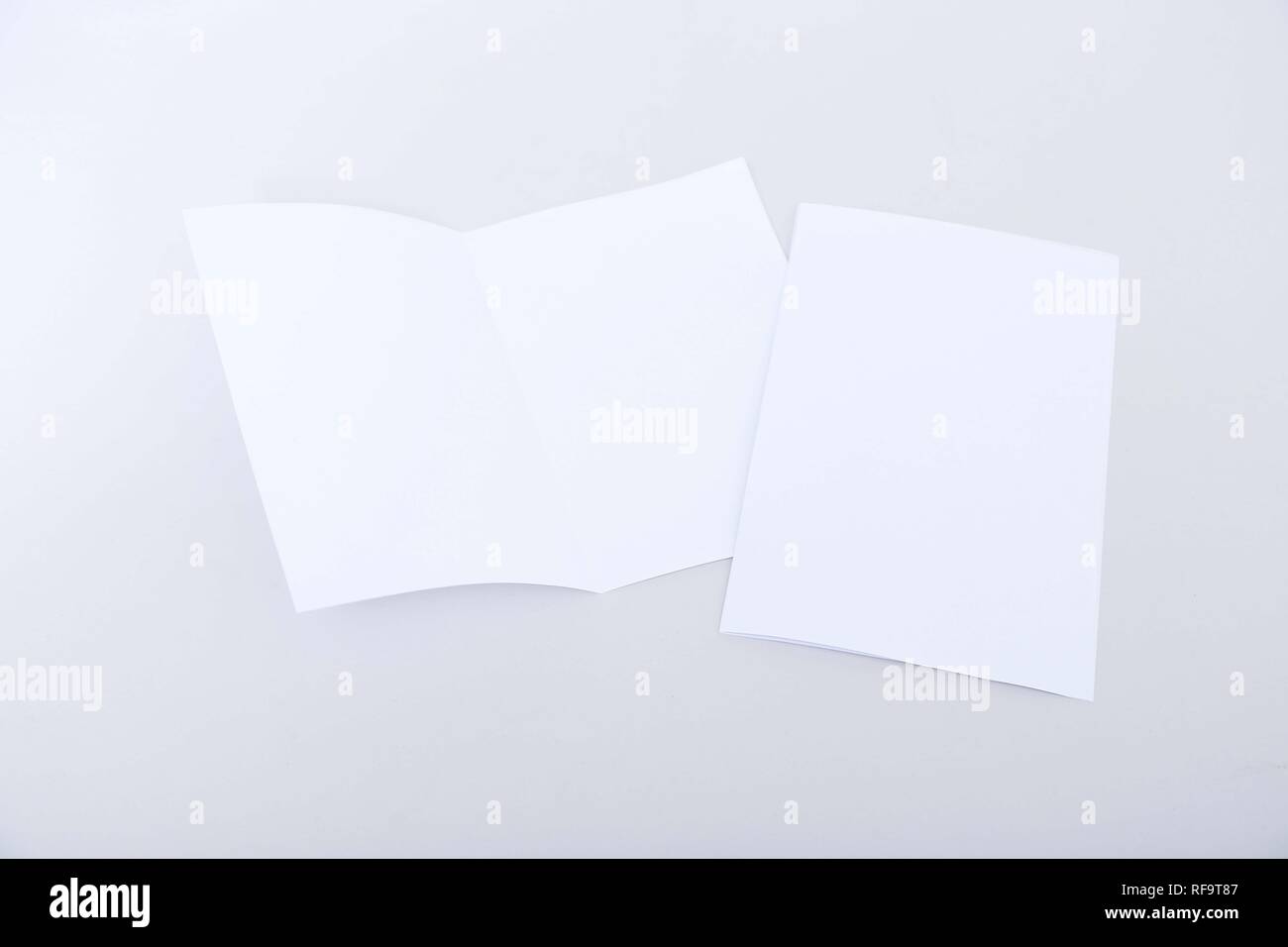 Blank white page of a folded magazine hi-res stock photography and ...