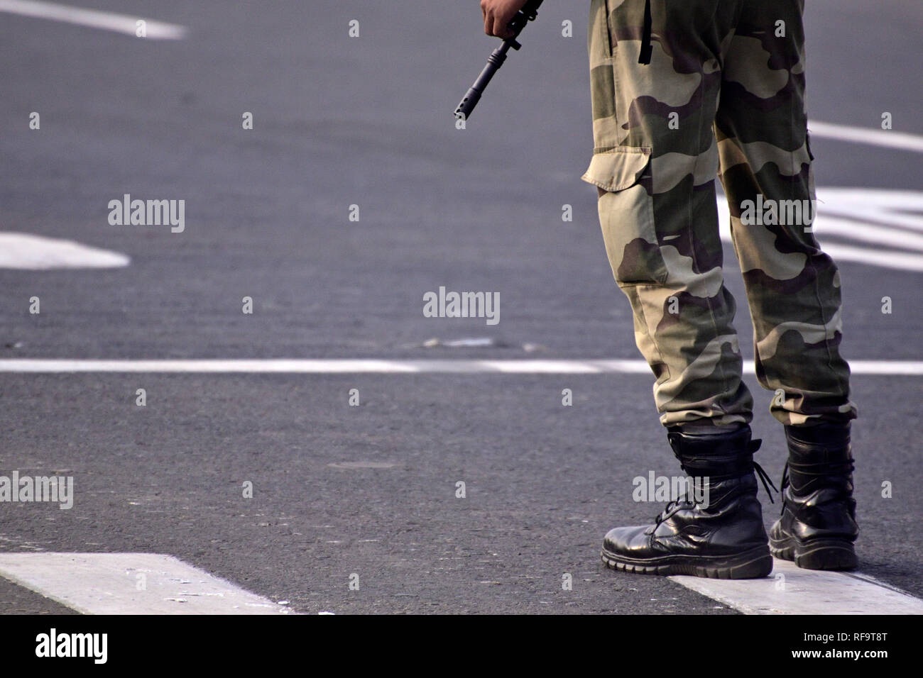 Security guard with rifle standing on outside to protect the area Stock ...