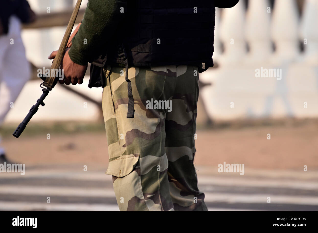 Security guard with rifle standing on outside to protect the area Stock ...