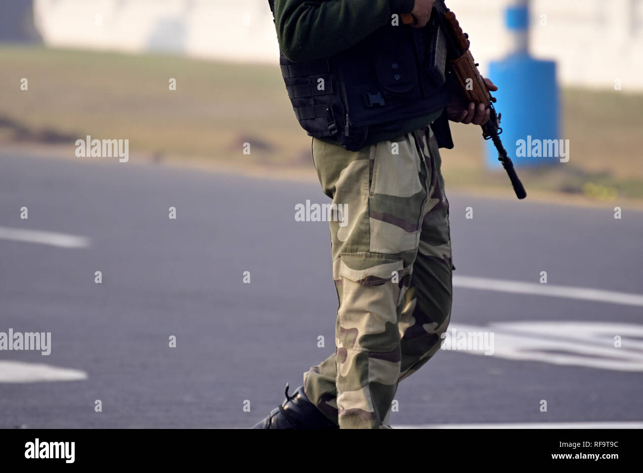 Security guard with rifle standing on outside to protect the area Stock ...
