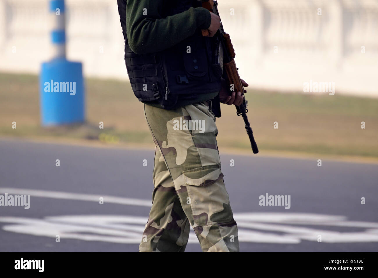 Security guard with rifle standing on outside to protect the area Stock ...