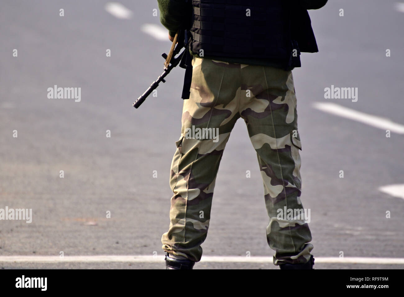 Security guard with rifle standing on outside to protect the area Stock ...