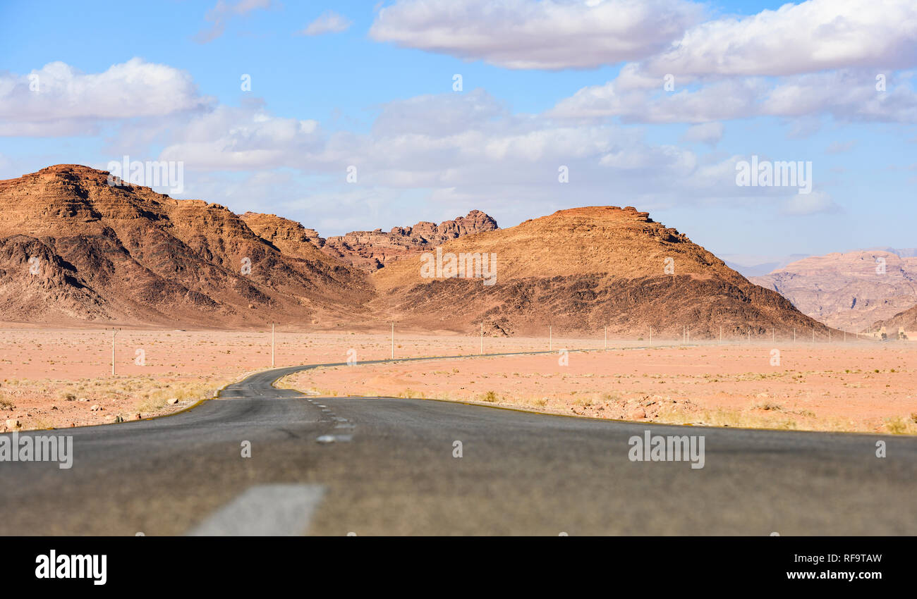 Kings highway, beautiful curvy road running through the Wadi Rum desert ...
