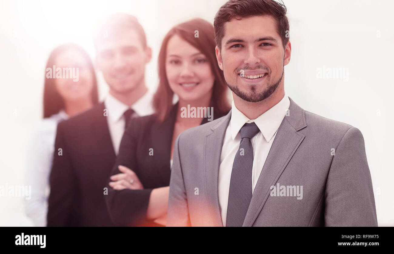leader and the business team standing one behind the other Stock Photo ...