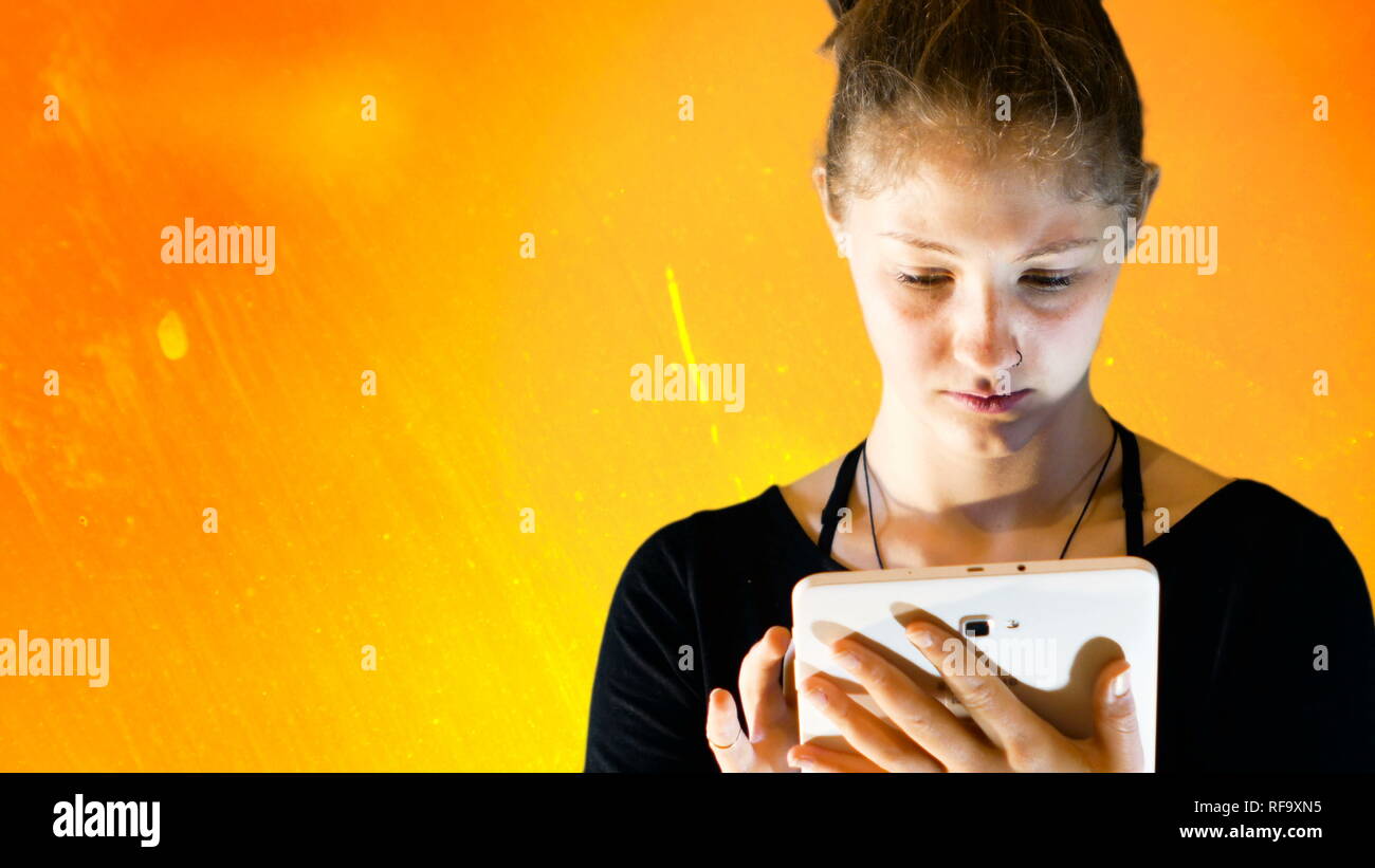 teenage girl talking on a tablet phone with her friend, ideal footage ...